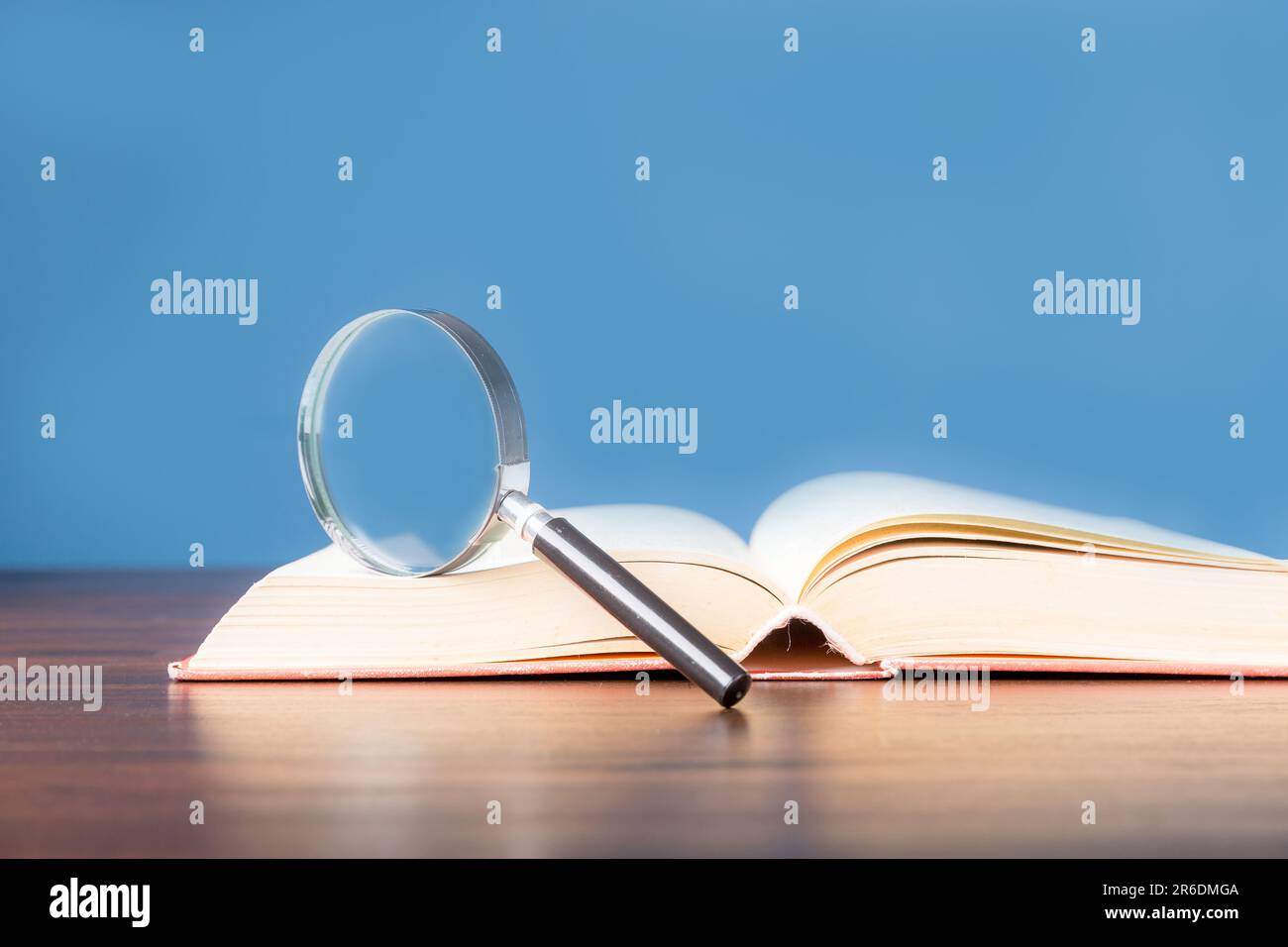 Book magnifying glass concept education hi-res stock photography and ...