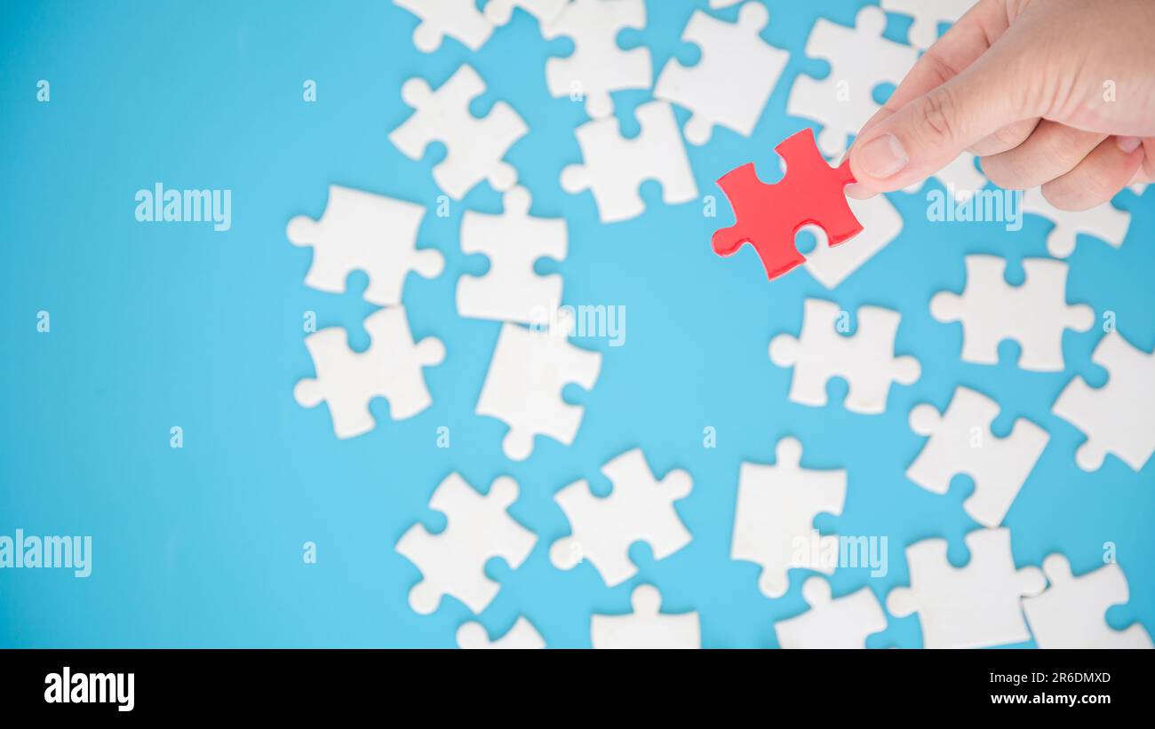 Human hands holding red jigsaw with word problem solution. symbol of ...