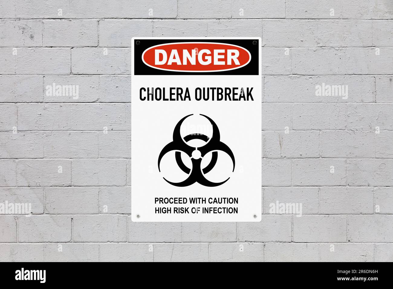 Warning sign screwed to a cinder block wall to warn about a health ...