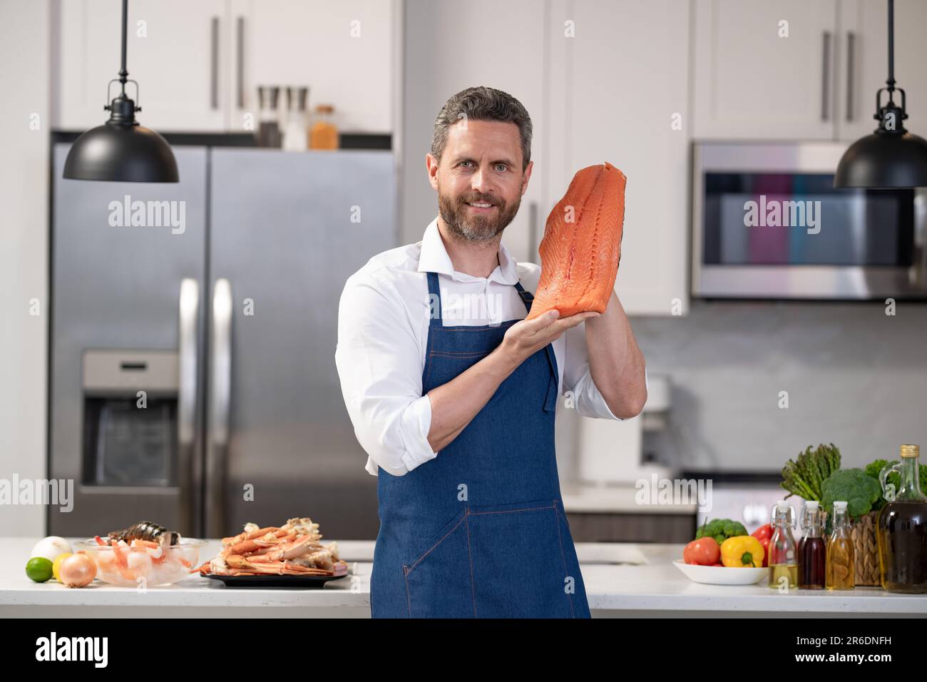 chef man cooking fish. chef man cooking fish. chef man cooking fish ...