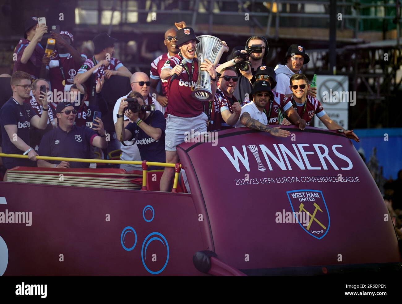 West Ham United players celebrate during an open top bus parade ...