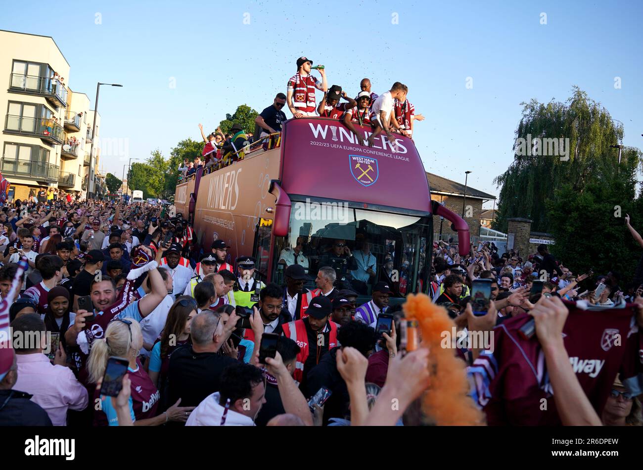 West Ham United players celebrate during an open top bus parade ...