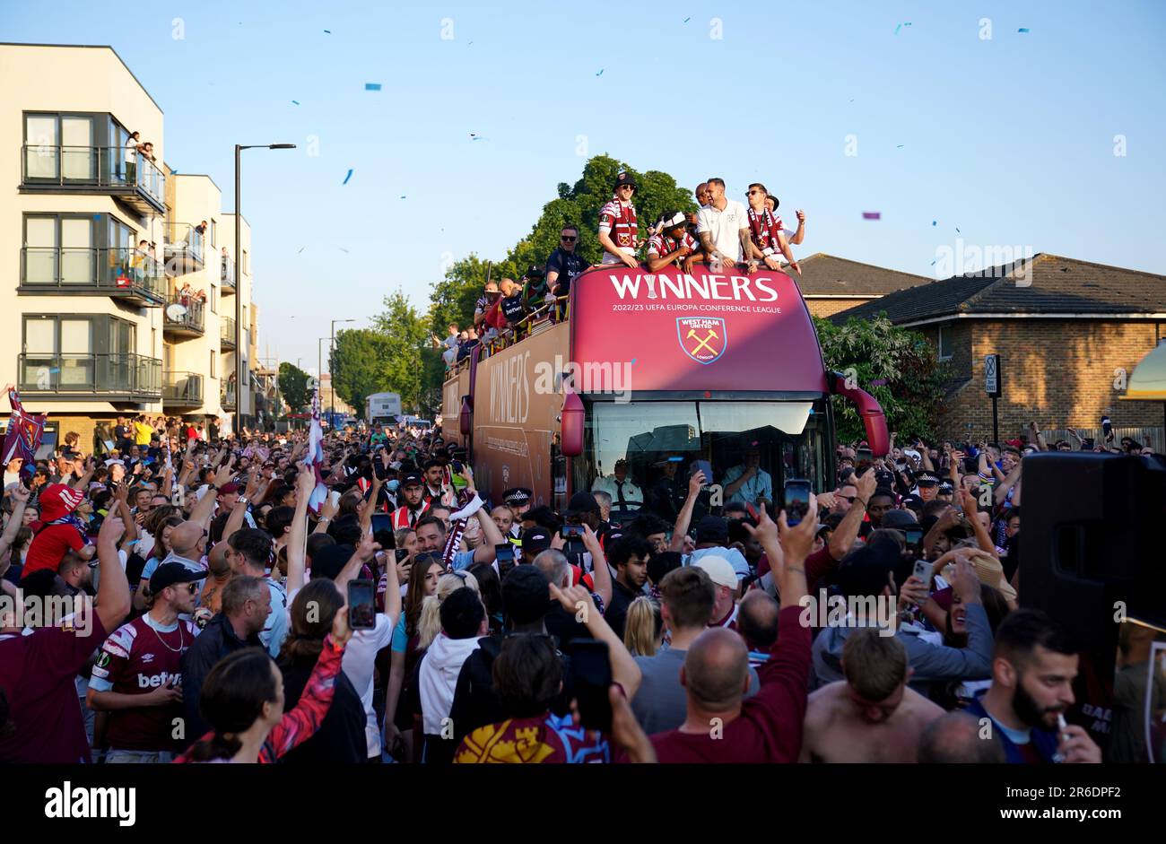 West Ham United players celebrate during an open top bus parade ...