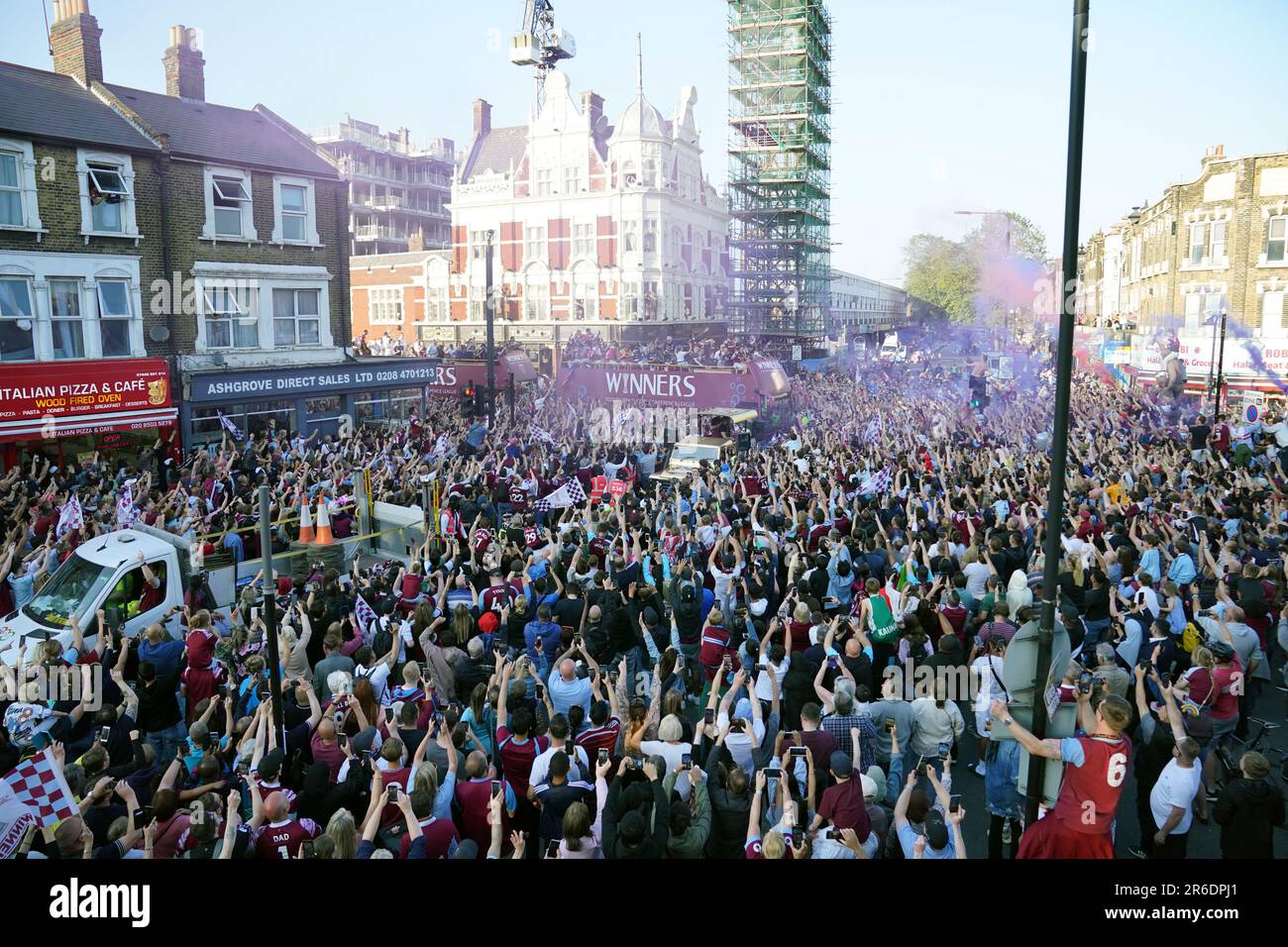 West Ham United players celebrate during an open top bus parade ...