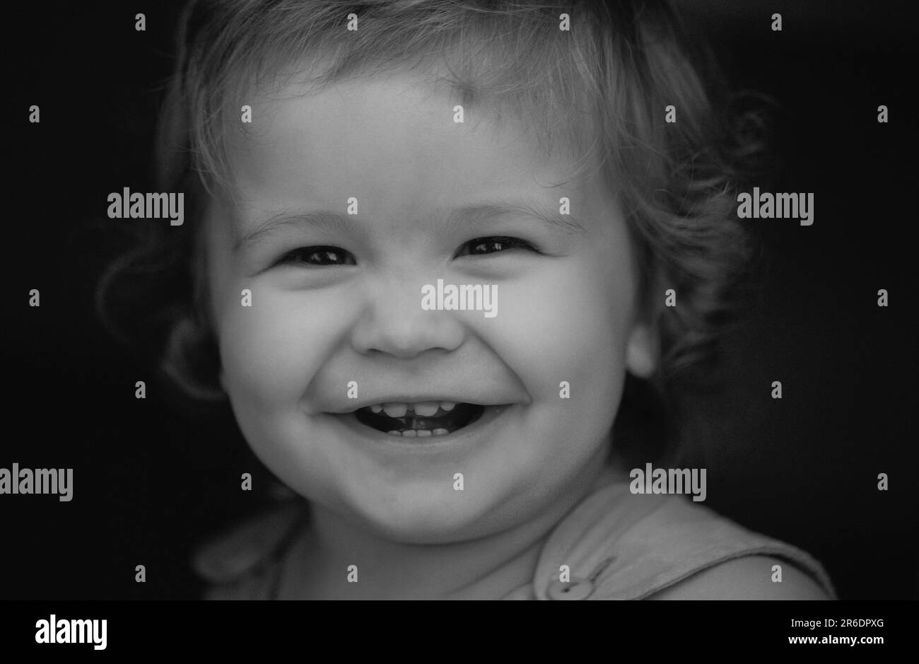 Portrait of a happy laughing baby. Close up positive kids face. Smiling ...