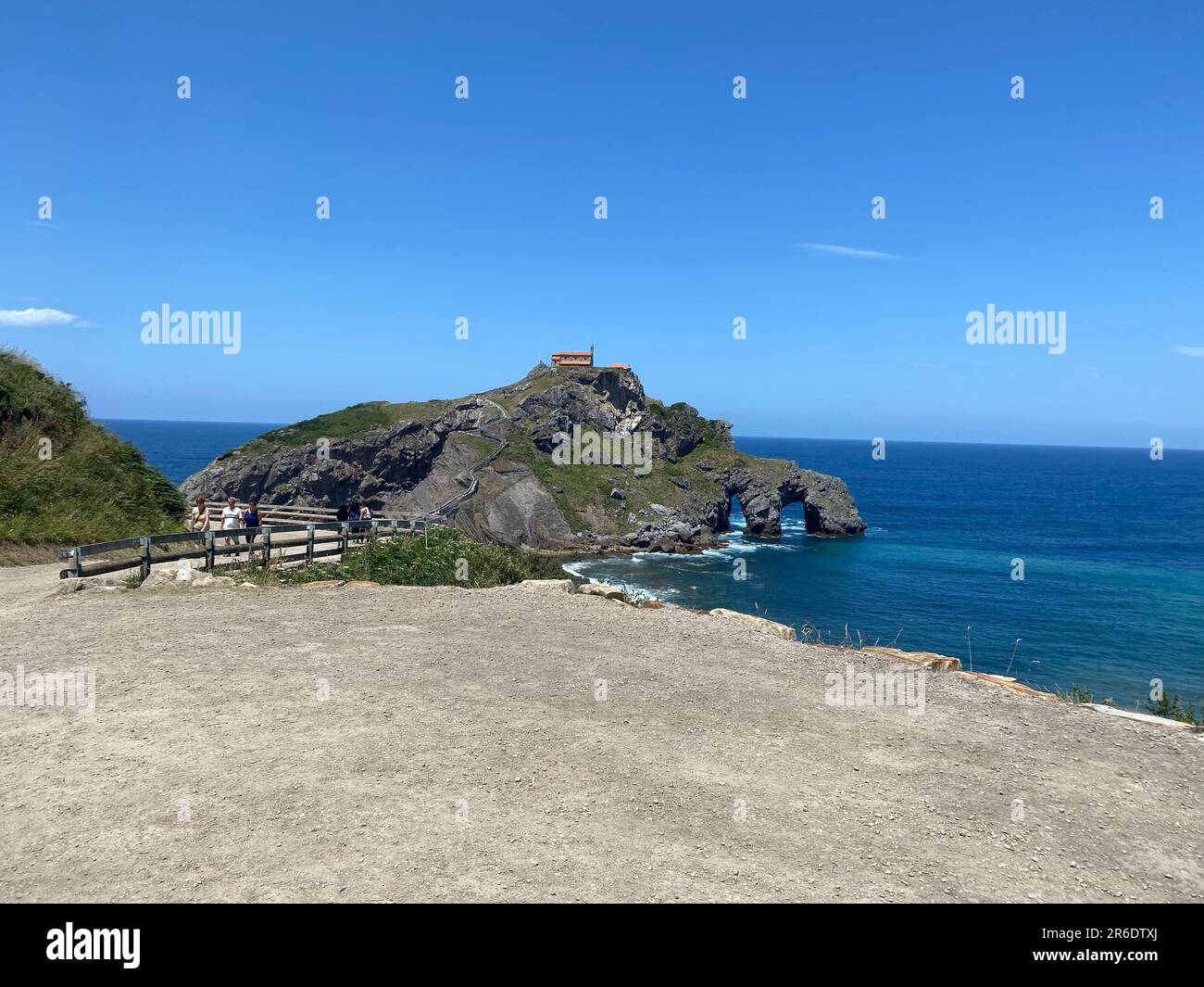 The historic Gaztelugatxe castle situated on a rocky outcropping ...