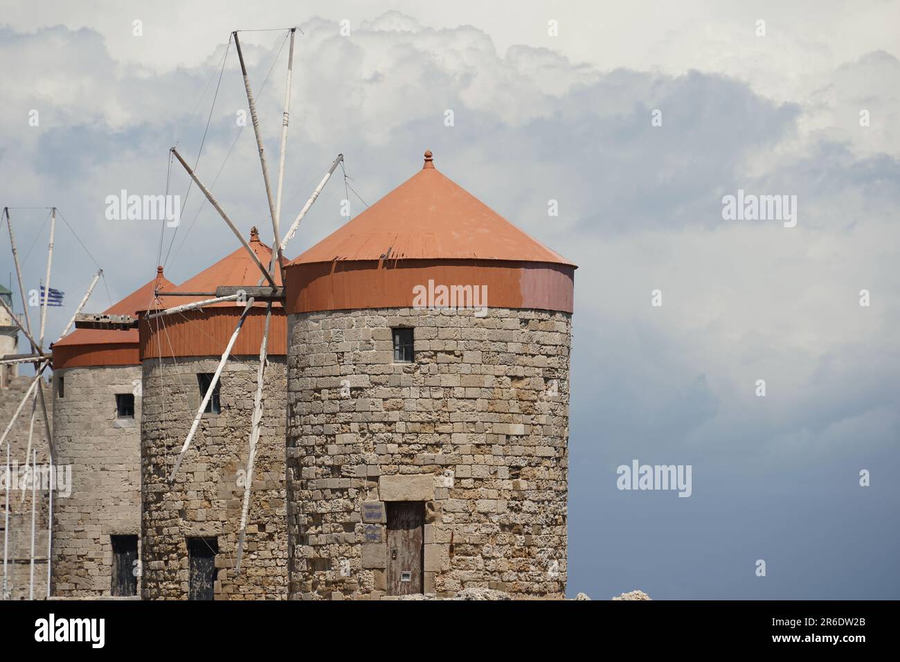 Medieval windmills of Rhodes town. Mandraki Harbour in the Dodecanese ...