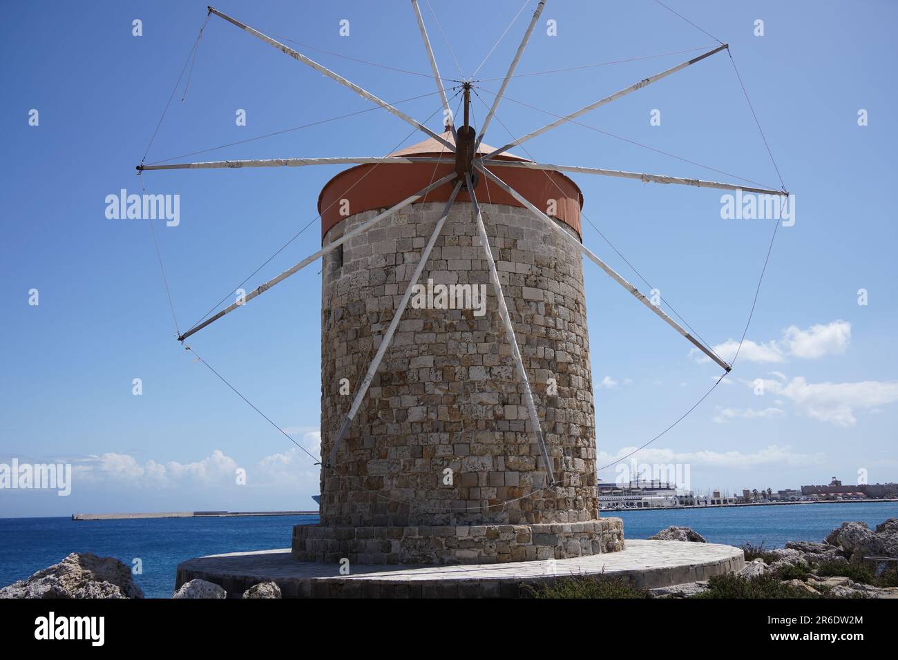 Medieval windmills of Rhodes town. Mandraki Harbour in the Dodecanese ...