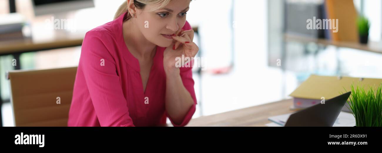 Frustrated woman biting her laptop hi-res stock photography and images ...