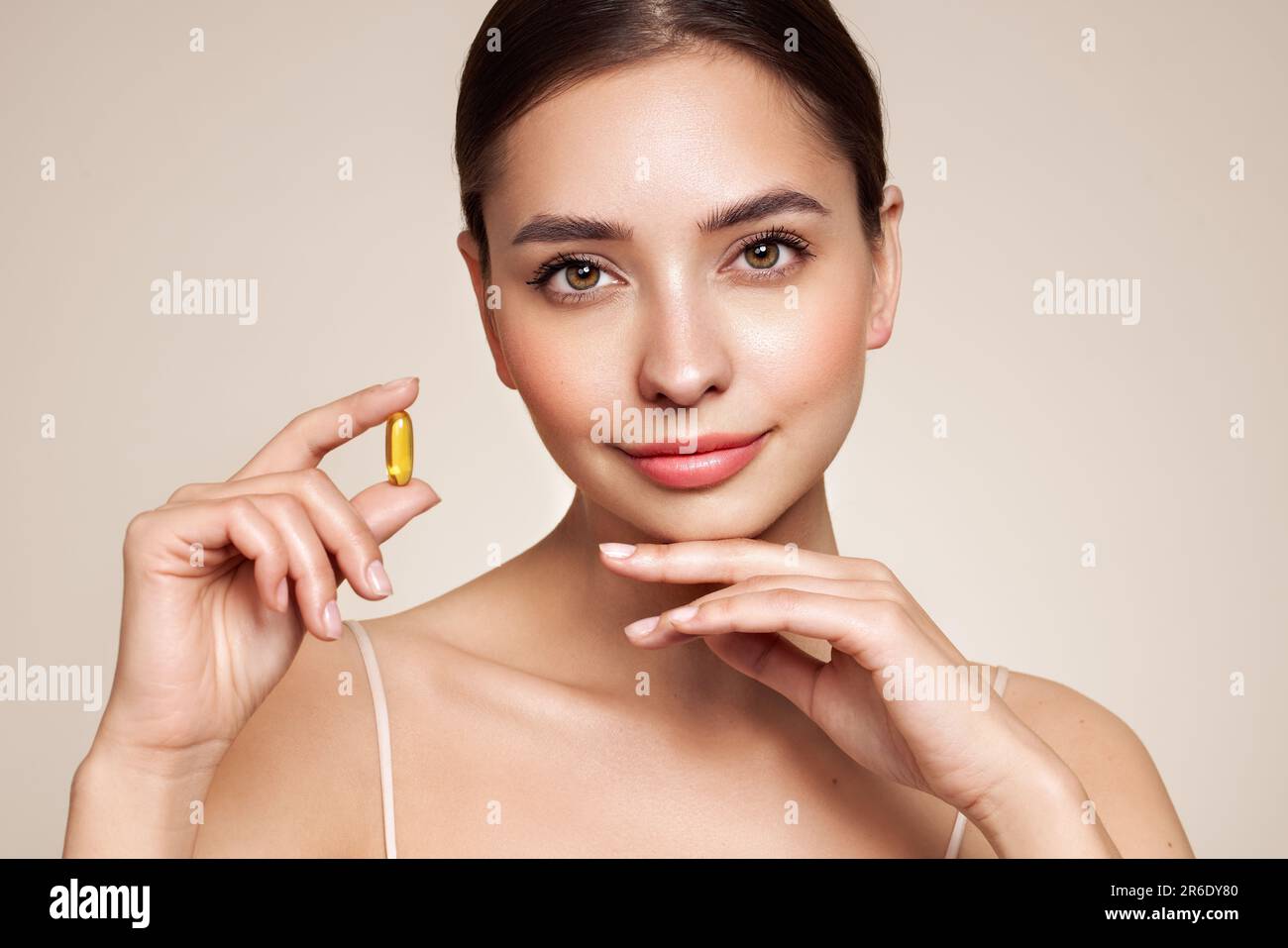 Vitamins. Close Up Of Happy Beautiful Girl With Pill With Cod Liver Oil Omega-3. Nutrition ...