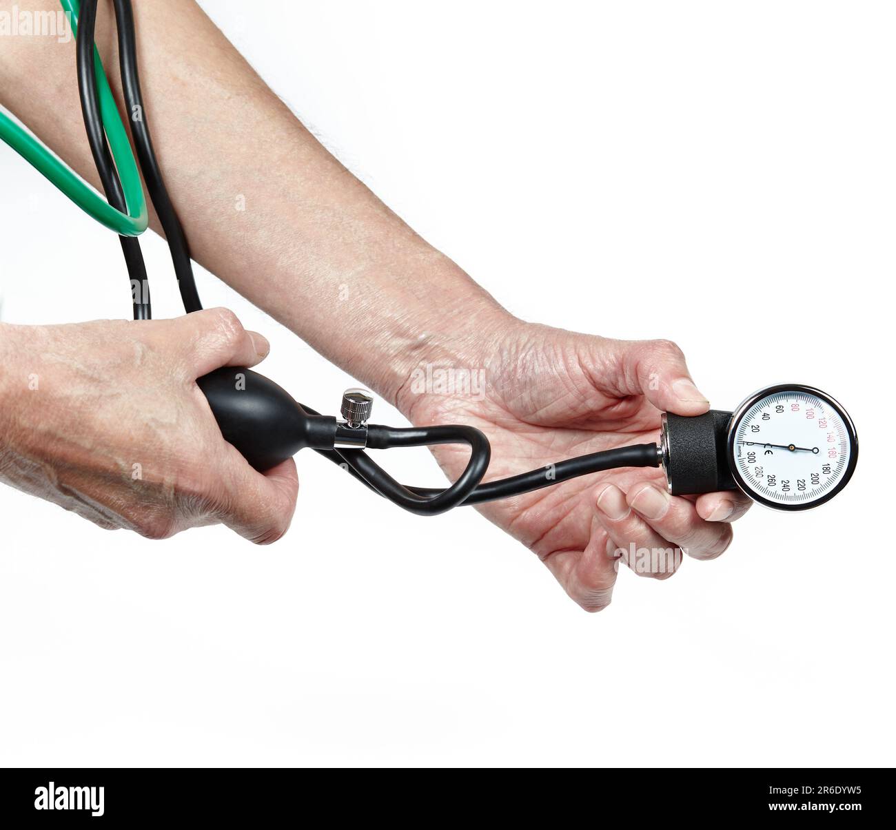 Man measuring blood pressure with tonometer herself isolated white ...