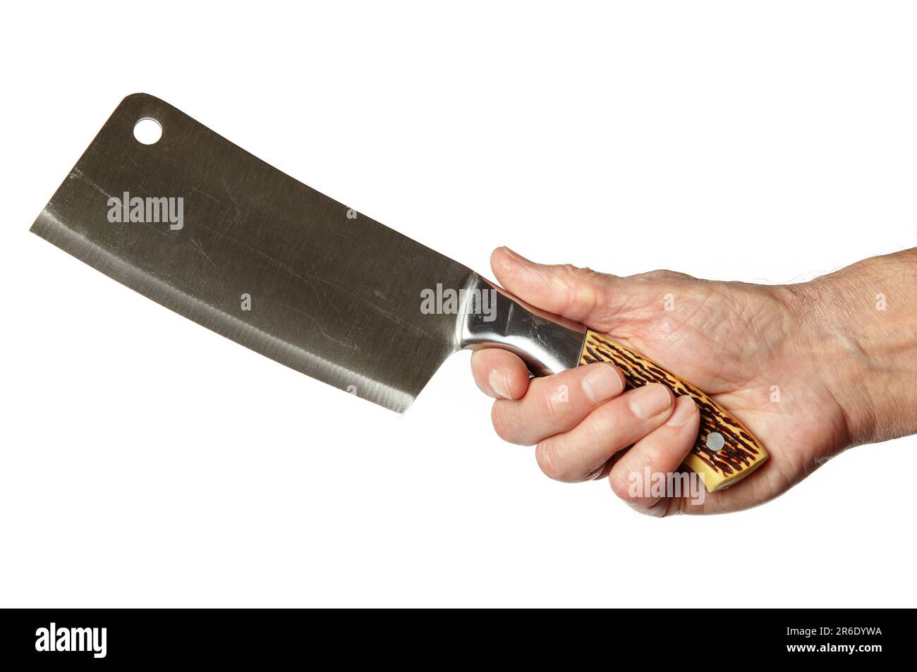 Men's hand holding meat cleaver isolated on white background. Stainless ...