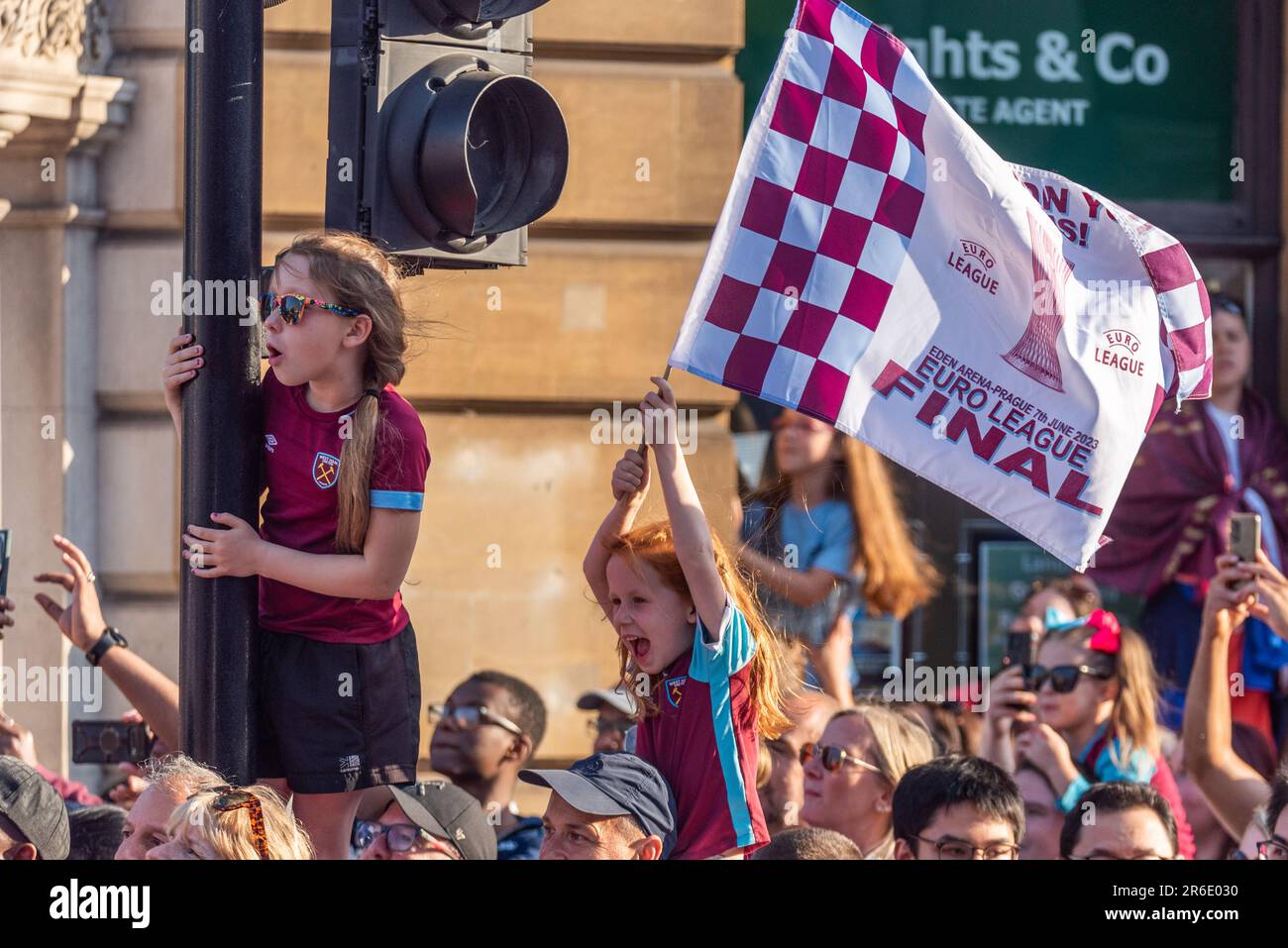 Young girl supporters at West Ham Utd football team's open top bus ...