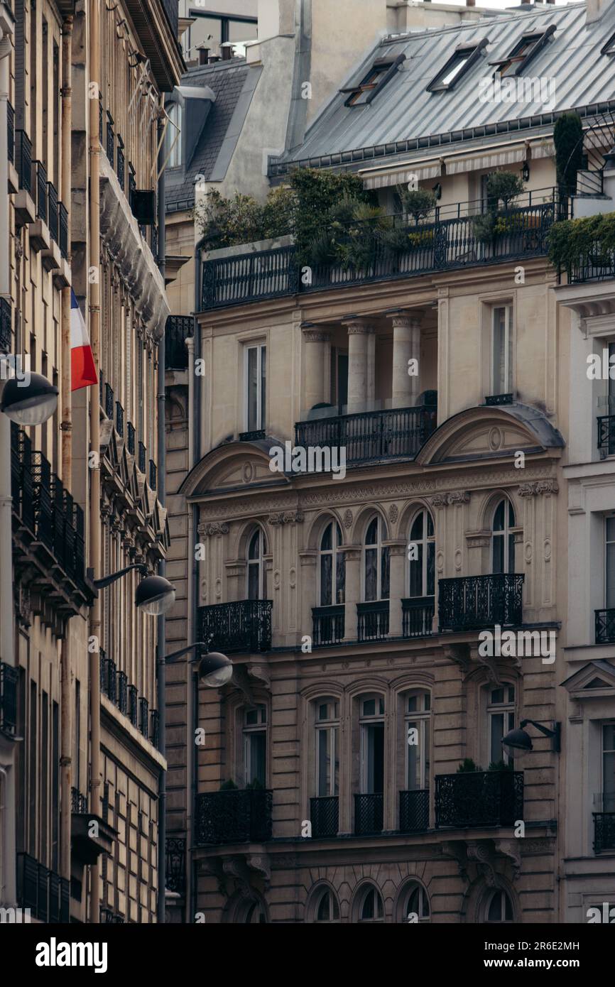 A vertical shot of a historic building in Paris, France, featuring a ...