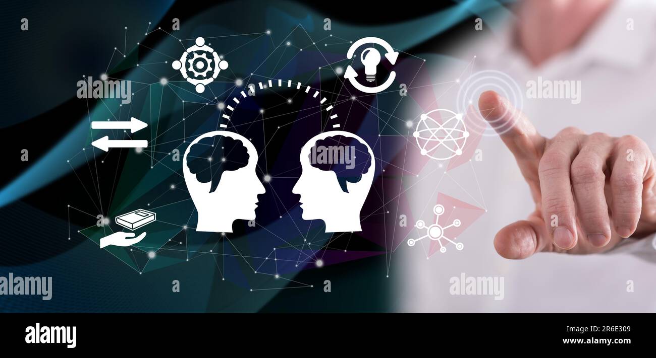 Man touching a knowledge sharing concept on a touch screen with his ...