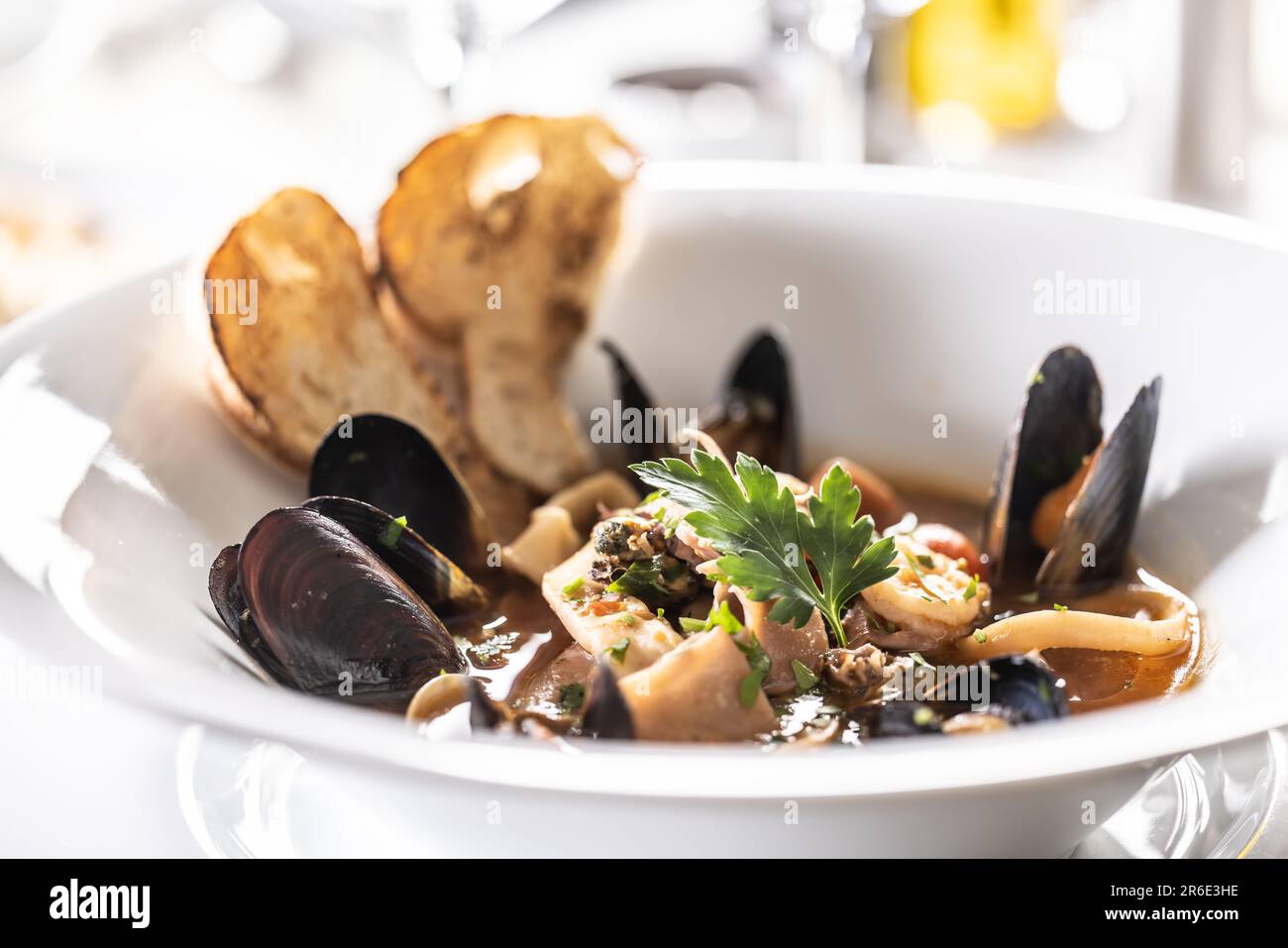 Italian seafood soup mussels hi-res stock photography and images - Alamy