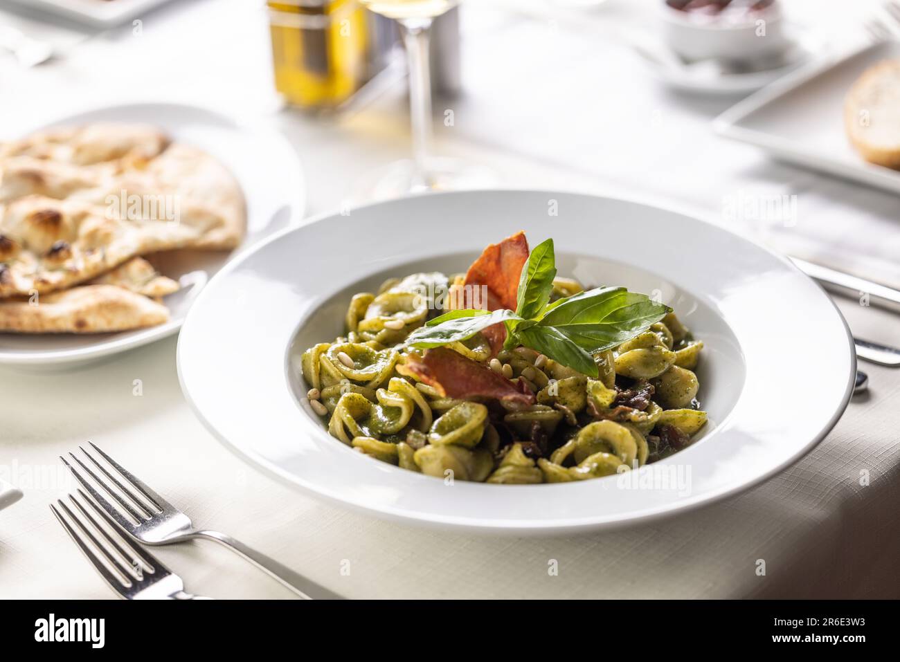 Orecchiette con pesto genovese e speck tirolese, Italian pasta with ...