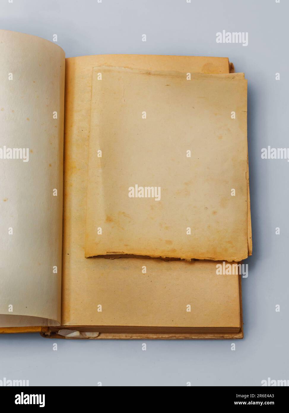 Open old book with blank pages and free space for text. The concept of ...