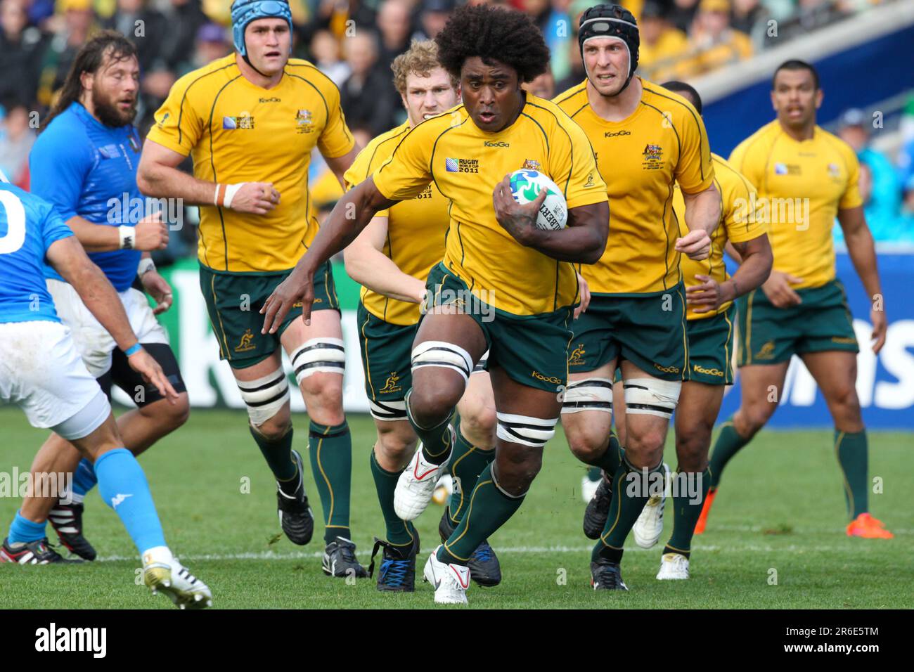 Australia's Radike Samo makes a run against Italy during the Pool C ...
