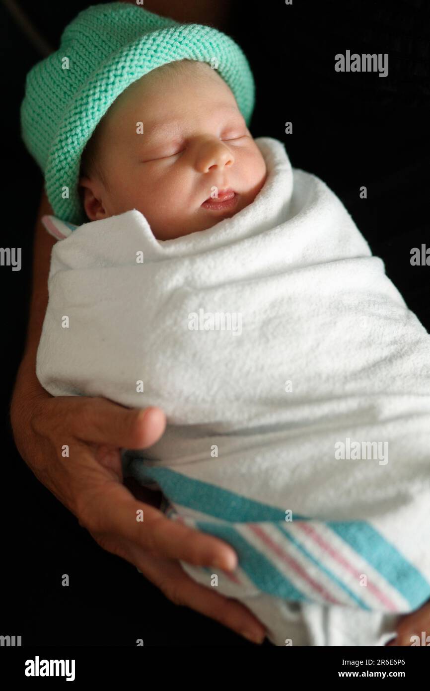 A newborn baby girl, only one day old Stock Photo - Alamy