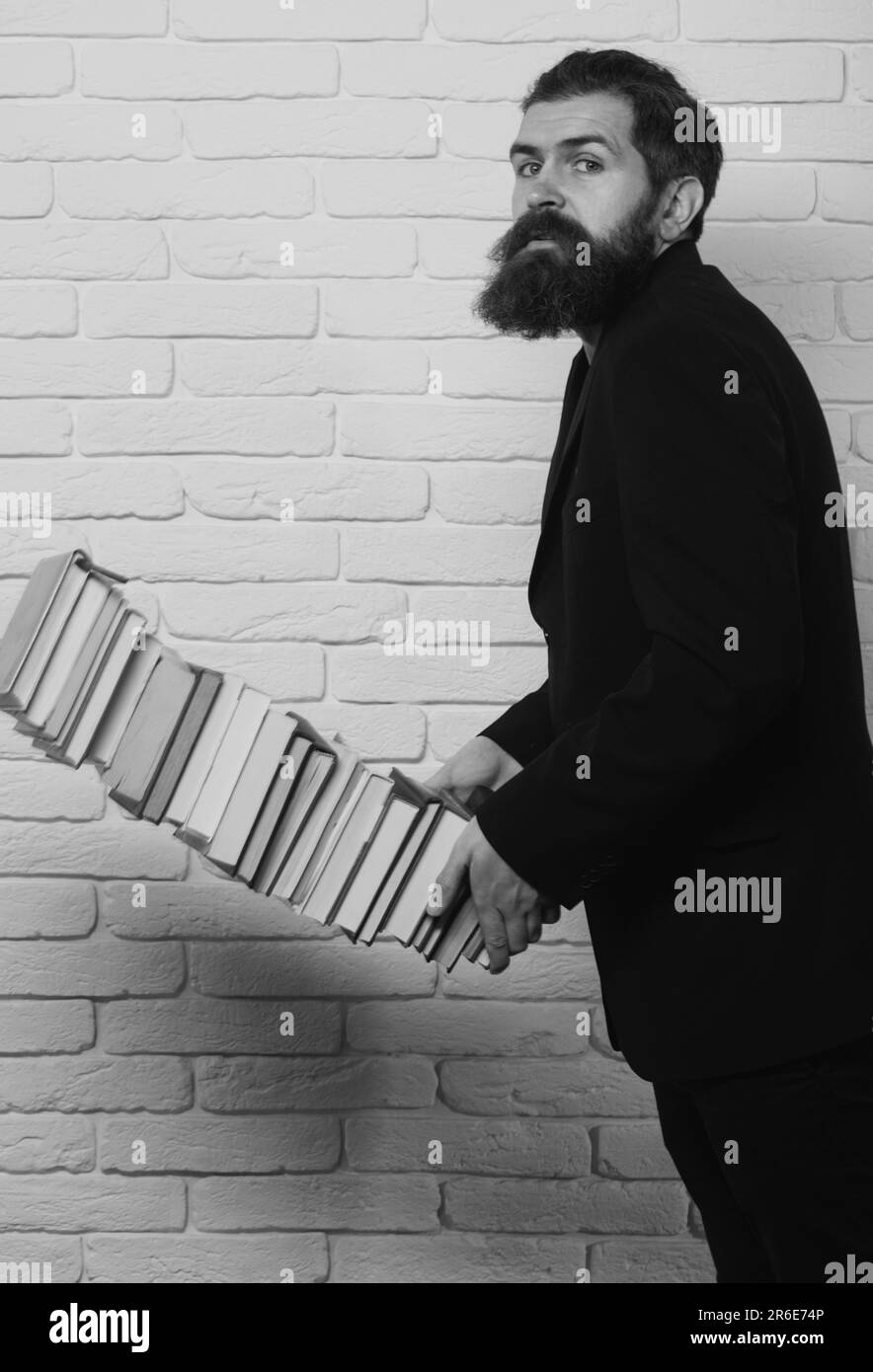 Books Stacked Fall Portrait Of A Funny Teacher Or Professor With Book Stack Thinking Serious