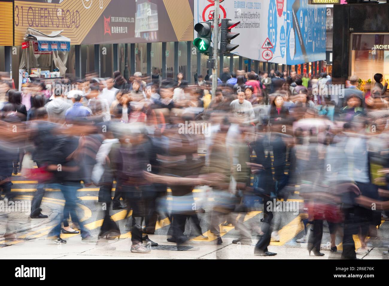 Crowds of people on the street in Hong Kong, China. Hong Kong is one of ...