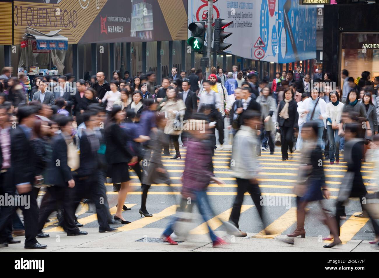 Crowds of people on the street in Hong Kong, China. Hong Kong is one of ...