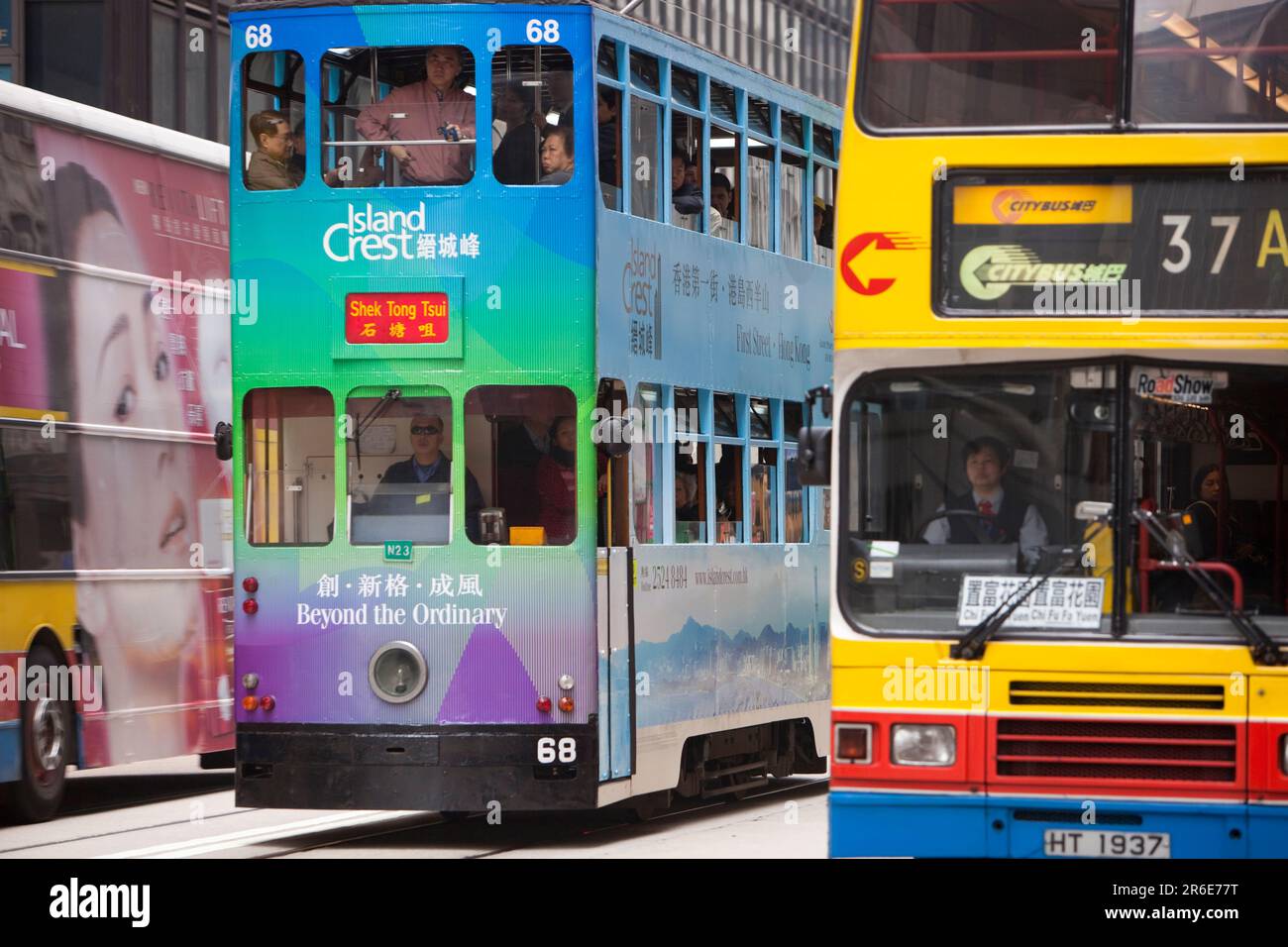 Public transport, Trams and a bus on the street in Hong Kong, China Stock Photo - Alamy