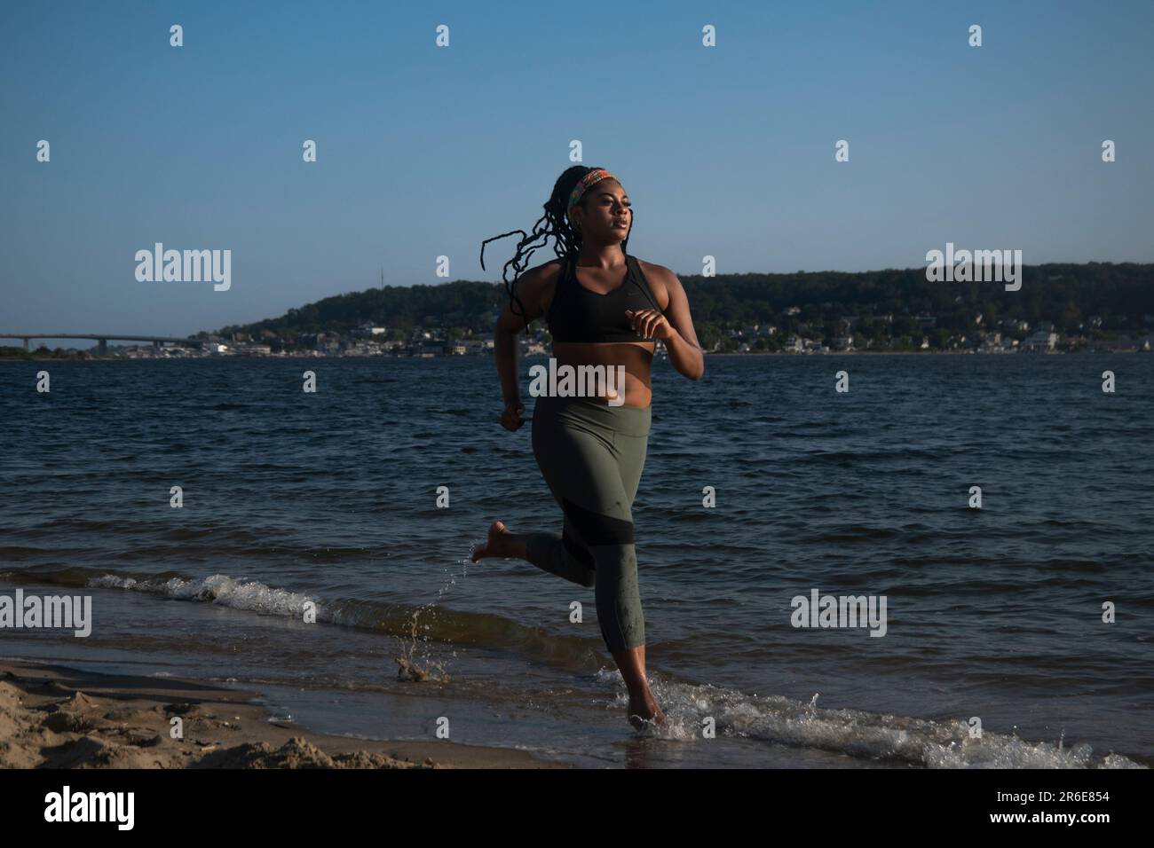 Female running on water hi-res stock photography and images - Alamy