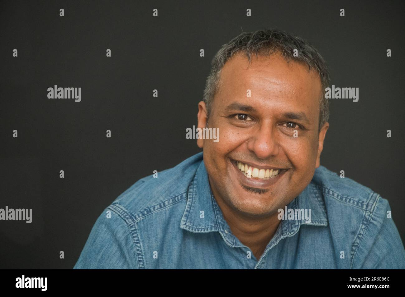 Indian Male casual portrait in studio Stock Photo - Alamy