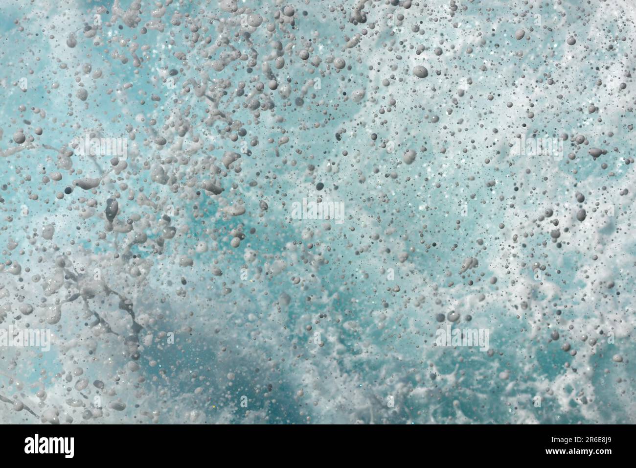 Sea spray from a wave hitting the seashore in Tenerife Stock Photo - Alamy