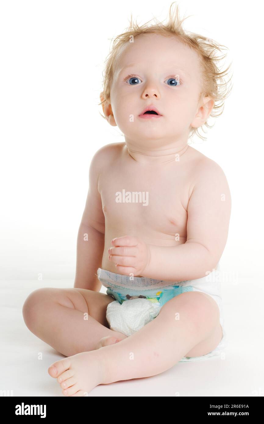 Cute baby in nappy playing on white background Stock Photo - Alamy
