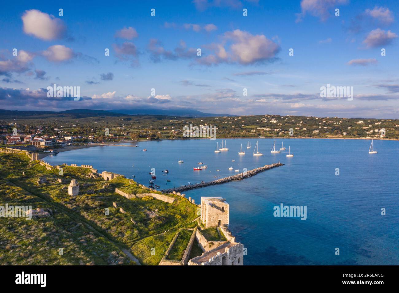 Bay of the city of Methoni in Greece with anchored boats Stock Photo ...