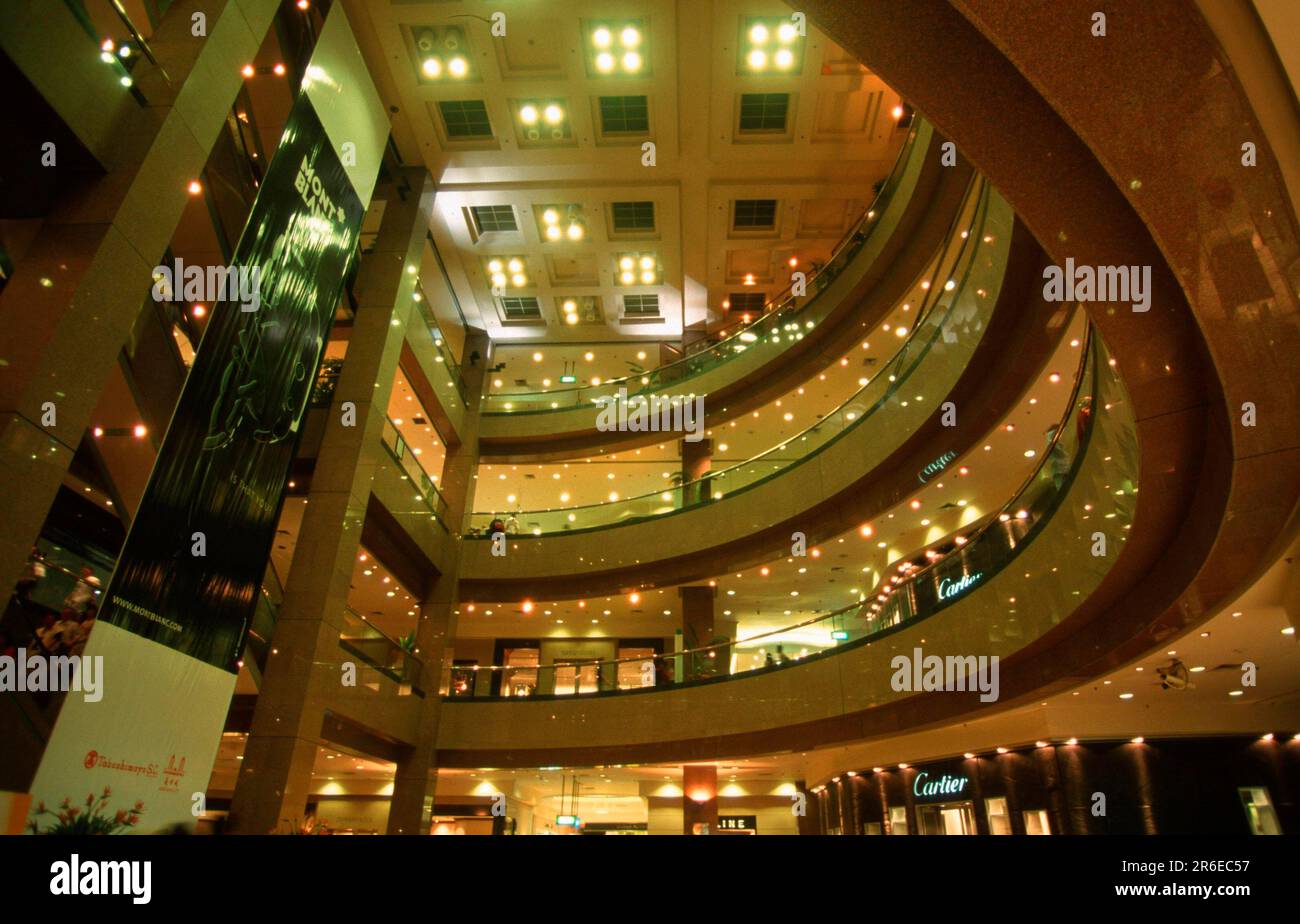 Shopping centre shopping mall singapore interior hi-res stock ...