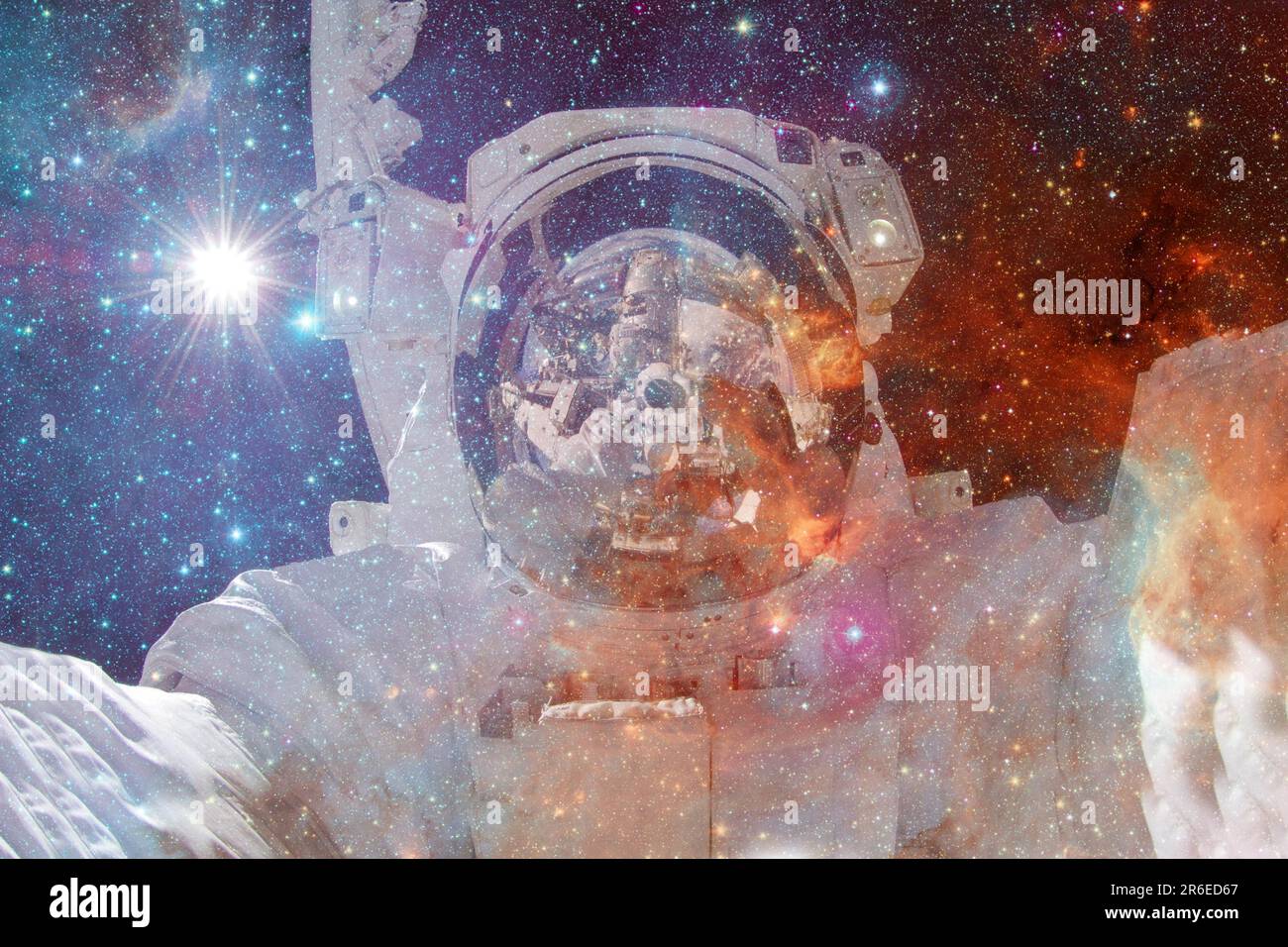 Astronaut. Nebula, cluster of stars in deep space. Science fiction art. Elements of this image ...