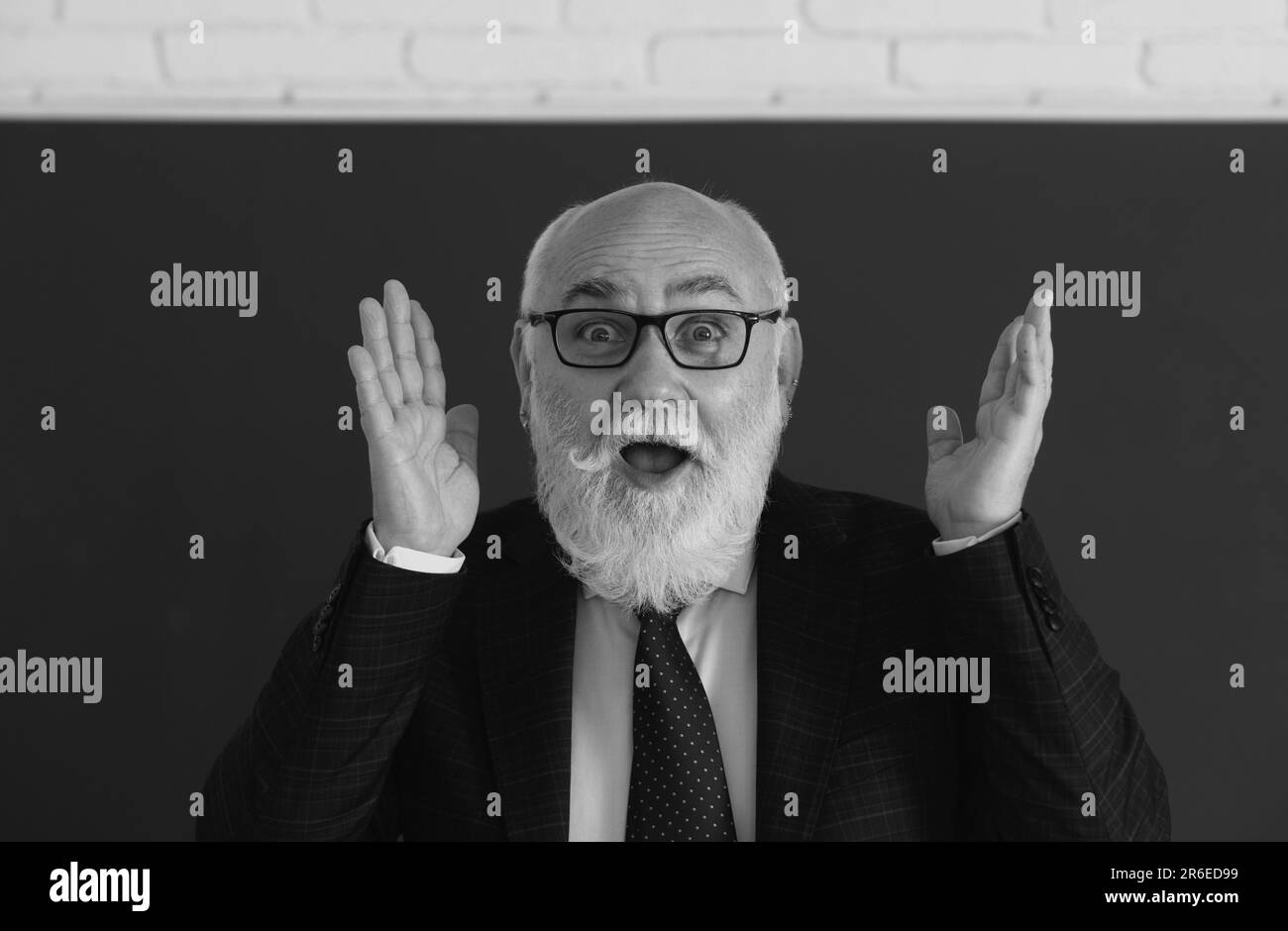 Old surprised face of funny teacher. Excited senior professor on ...