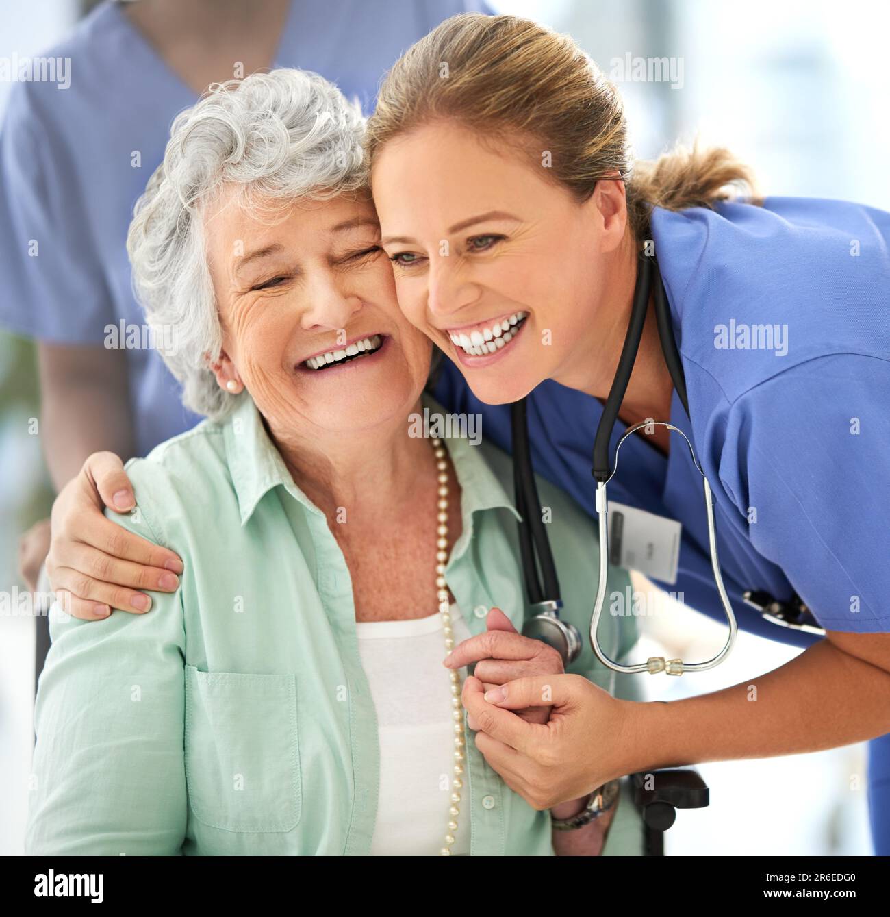 Nurse Senior Woman And Happy Hug Of Caregiver And Smile With Support