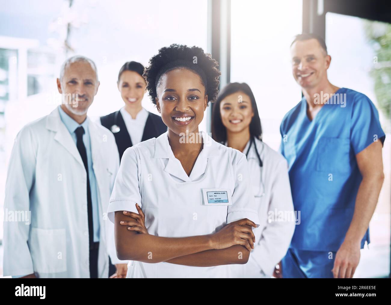 Smile, team and portrait of black woman with doctors, nurses and ...
