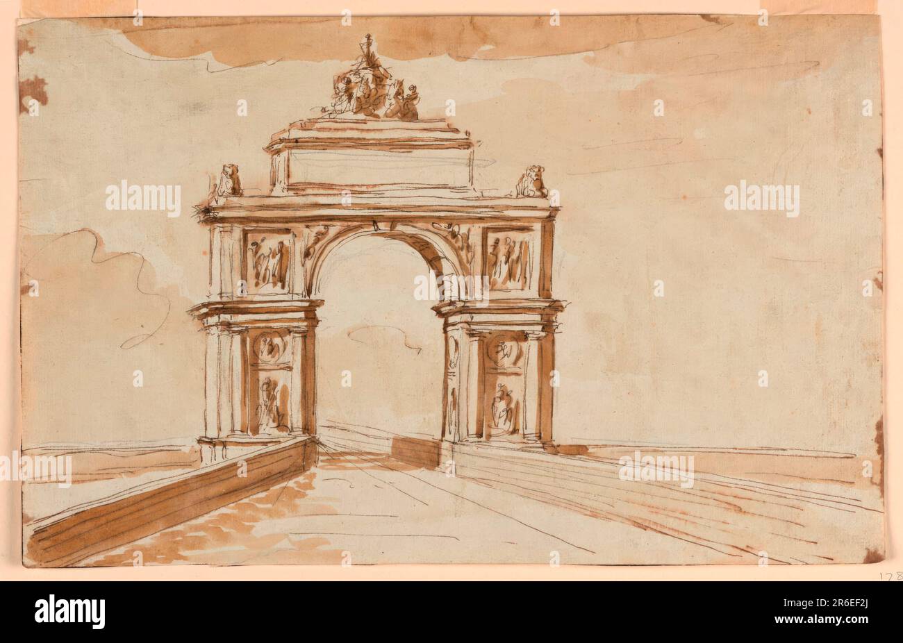 A bridge leads to and passes under the arch. The fron shows below pairs ...