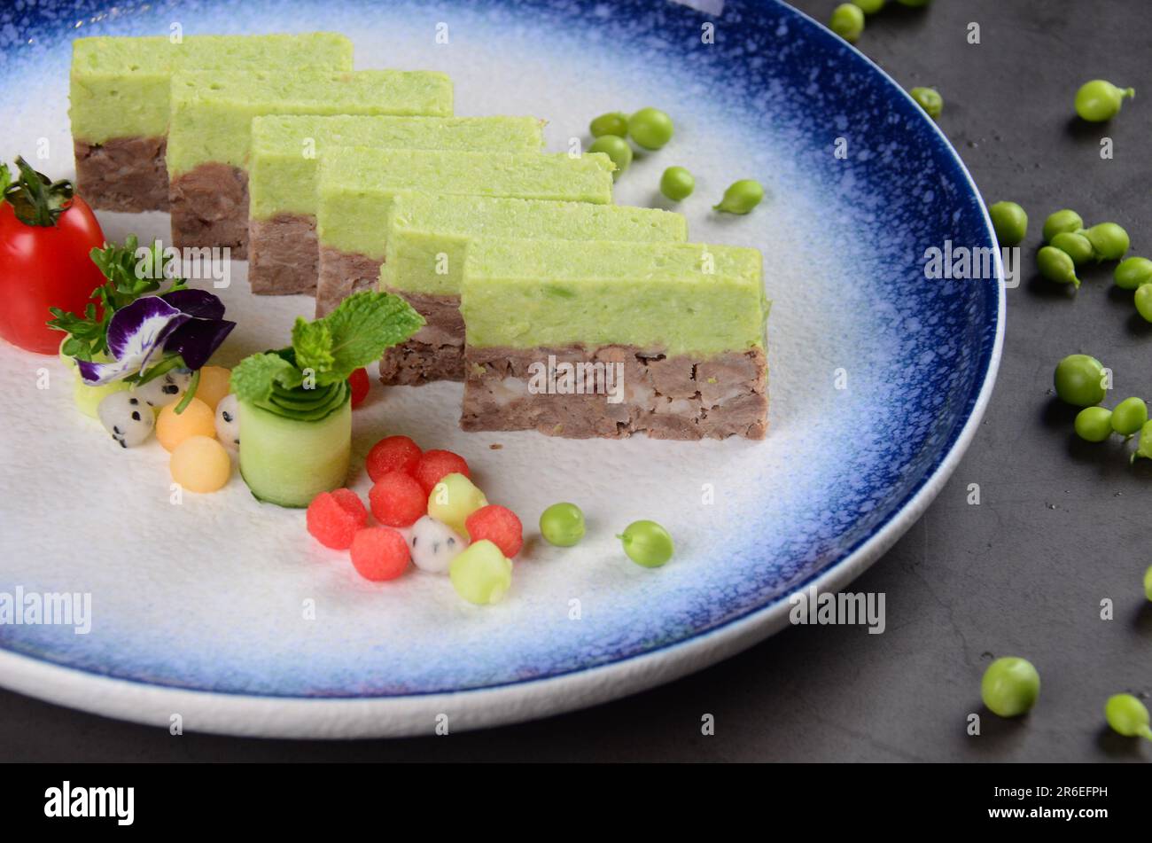 Traditional Chinese dessert with green bars and colorful decoration ...