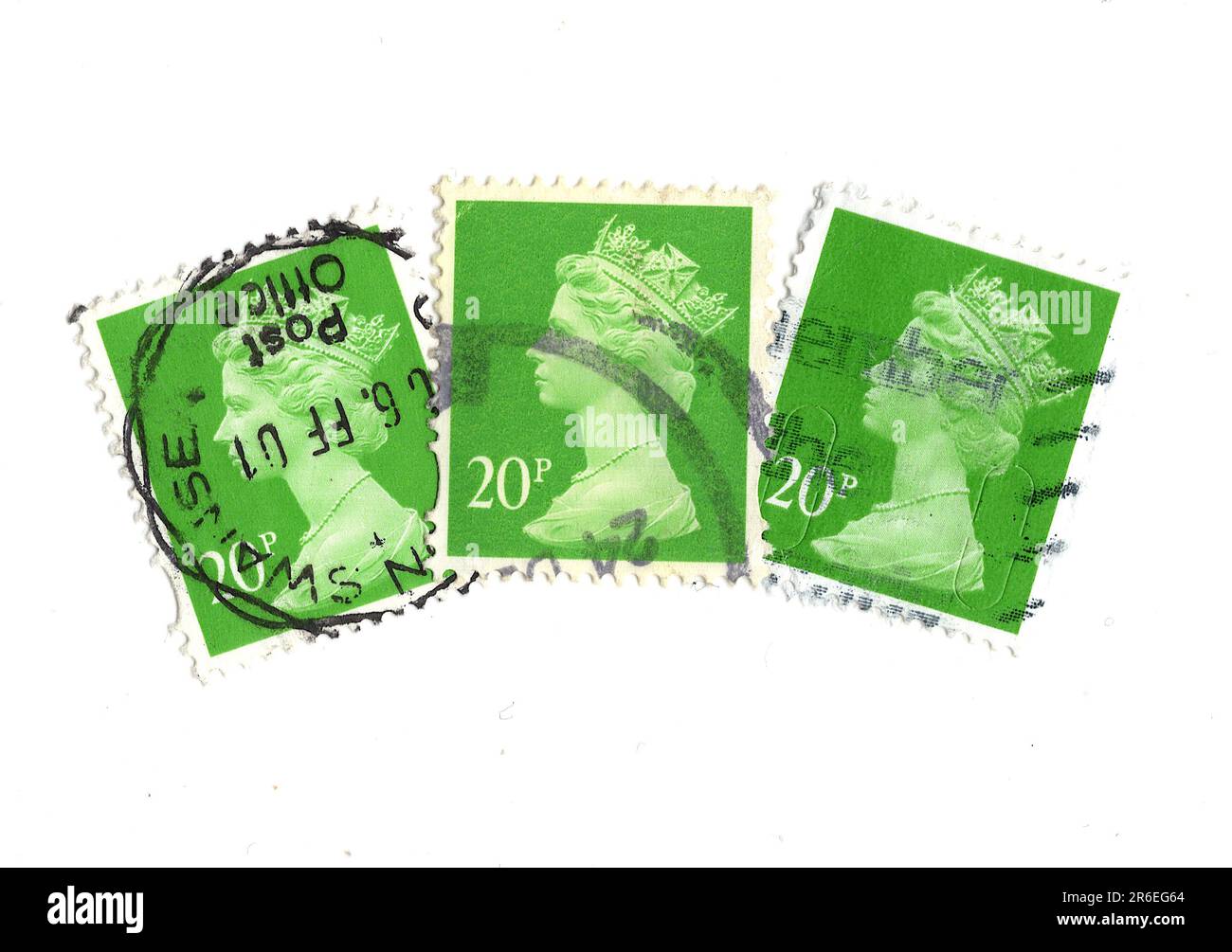 A montage of green 20p vintage postage stamps from the United Kingdom ...