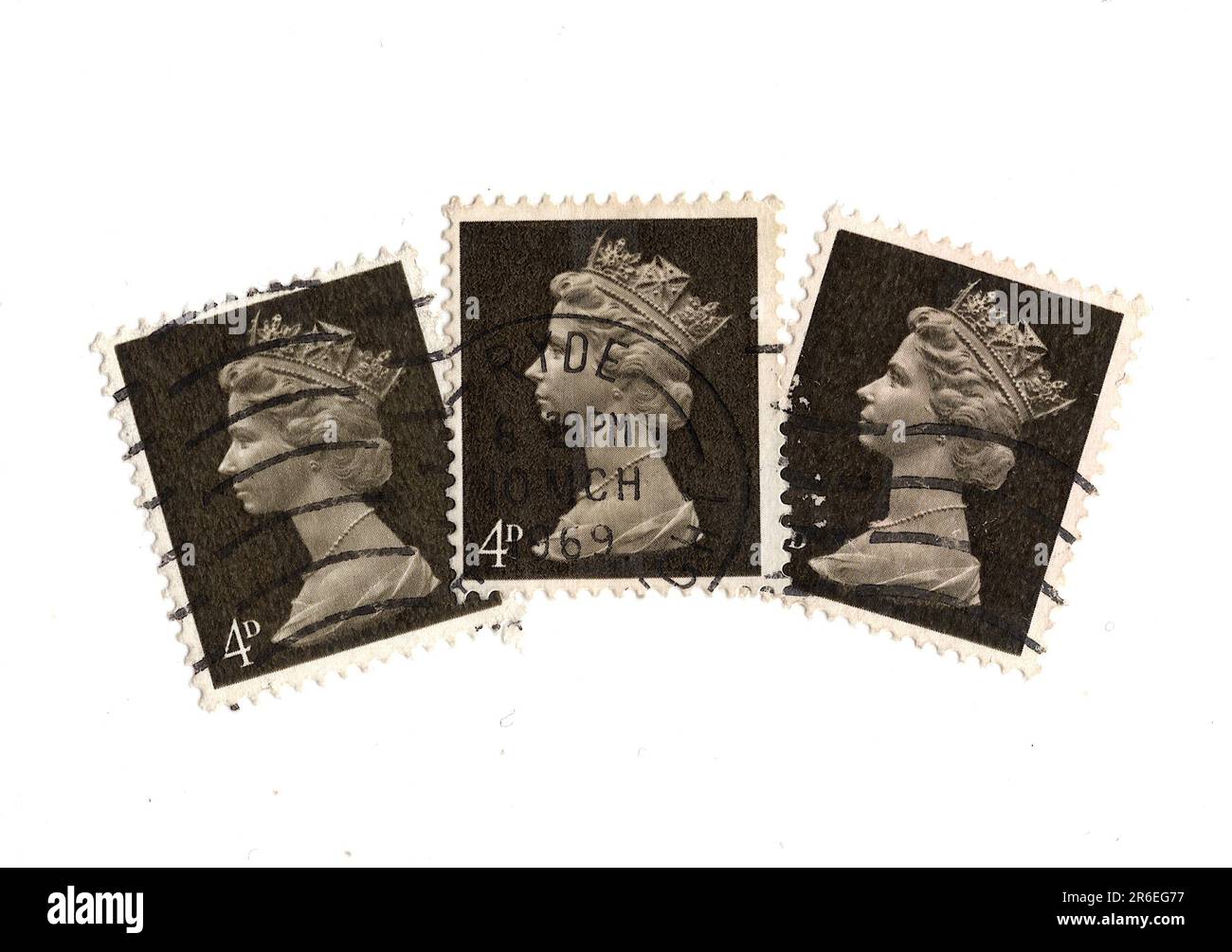 A montage of black 4p vintage postage stamps from the United Kingdom ...