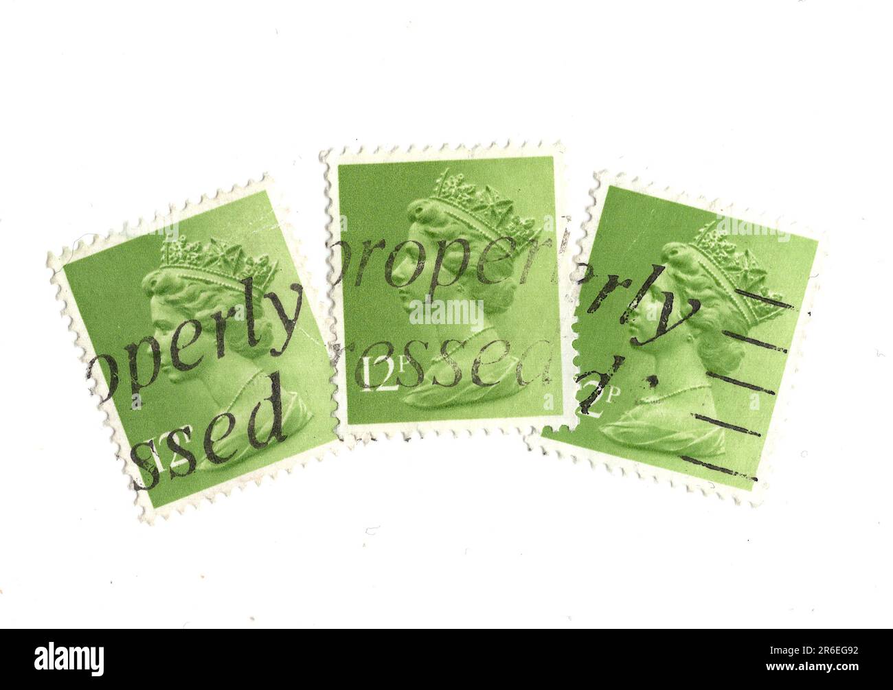 A montage of green 12p vintage postage stamps from the United Kingdom ...