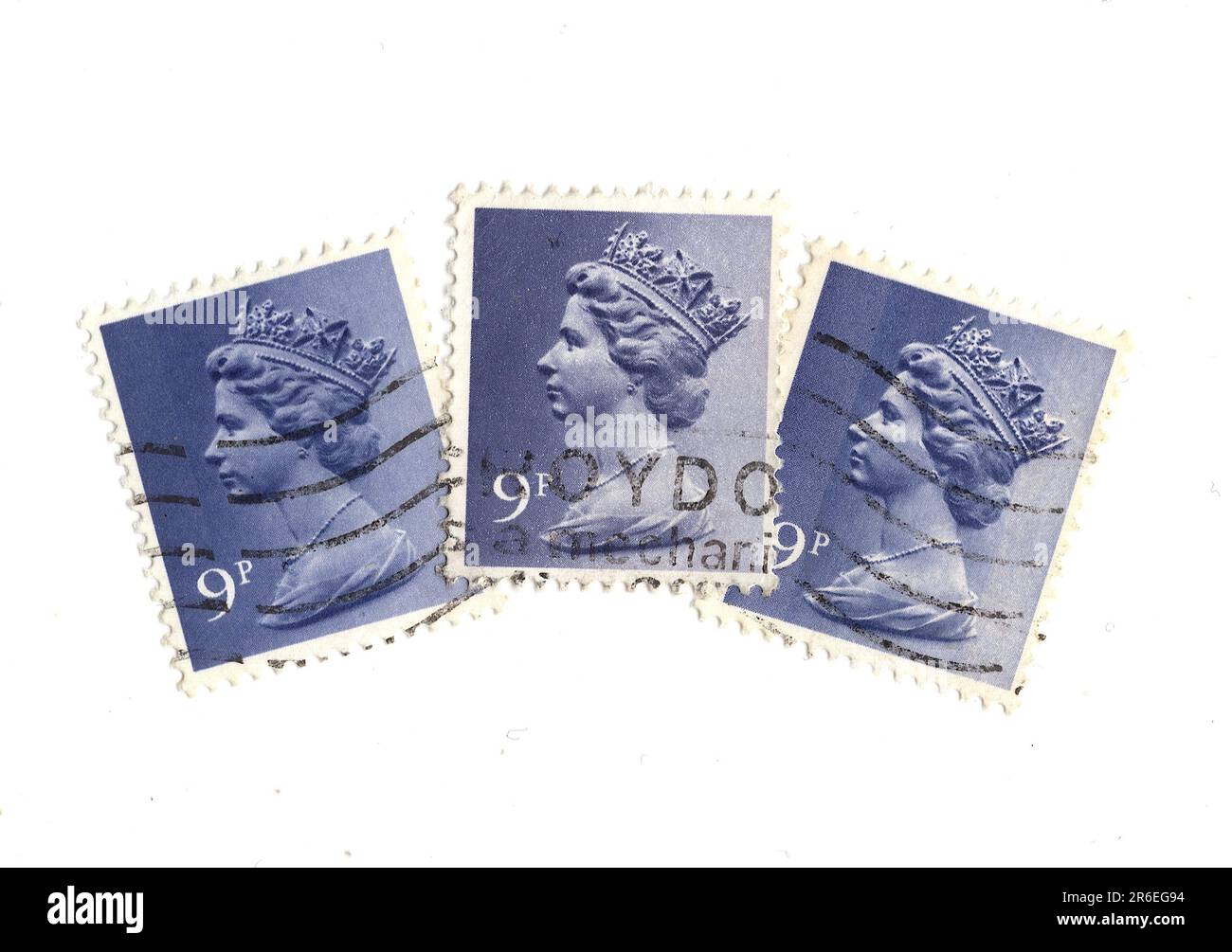 A montage of blue 9p vintage postage stamps from the United Kingdom ...