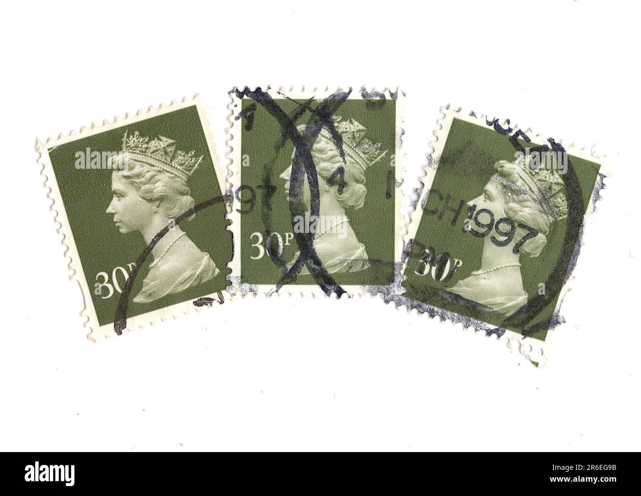 A montage of green 30p vintage postage stamps from the United Kingdom ...