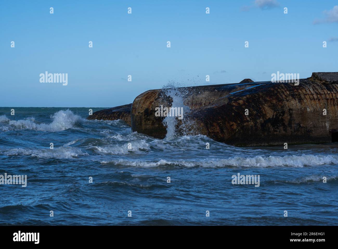 A picturesque view of crashing waves at Thy National Park in Denmark ...