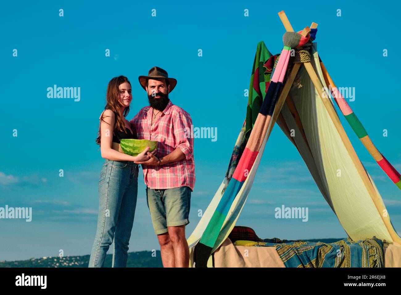 Romantic couple in tent on camping. Outdoor adventure with friends on ...