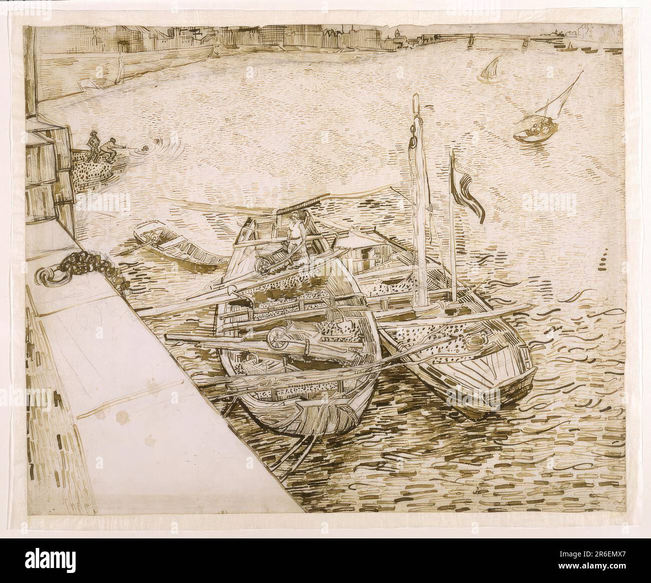 Rhone River scene in Arles: Two boats loaded with sand are moored by a ...