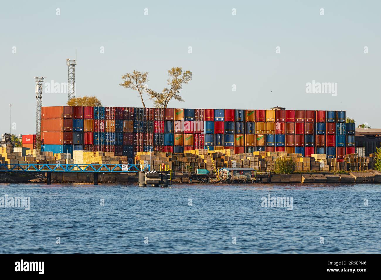 An aerial view of a cargo container port, featuring numerous large ...
