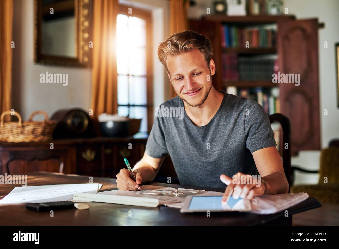 College research, studying and a man with a tablet for home work, education and elearning. Smile ...